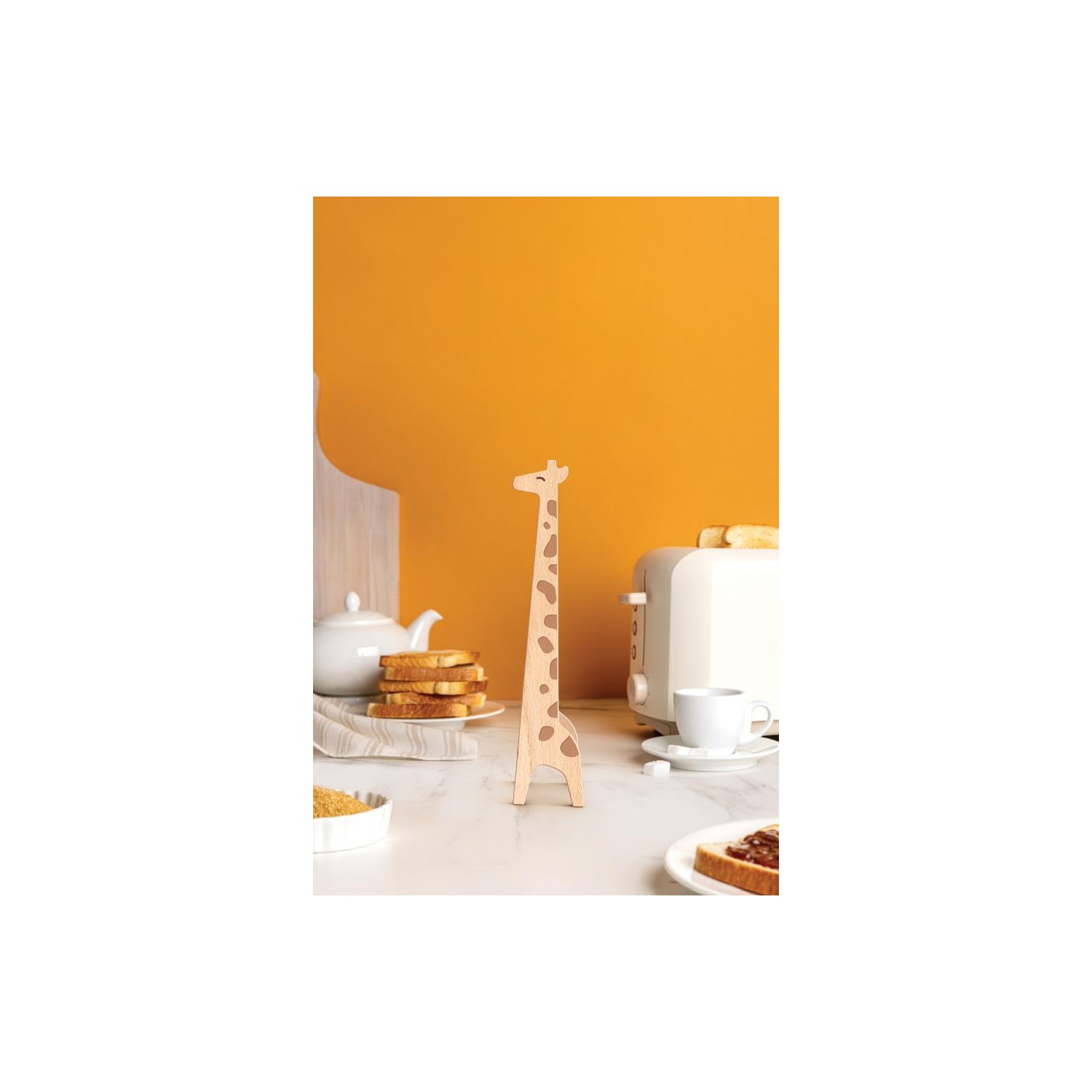 Meet Jerry, the giraffe-shaped wooden tongs that reaches into toasters!